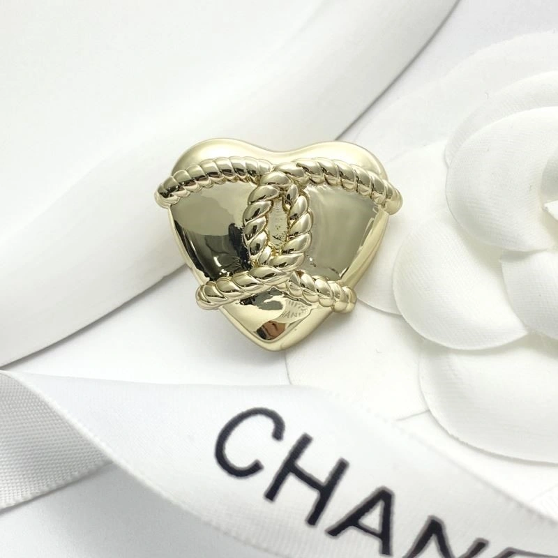 Indistinguishable Chanel Brooches