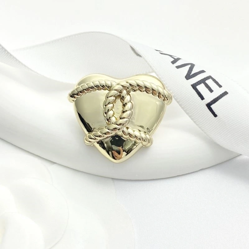 Indistinguishable Chanel Brooches