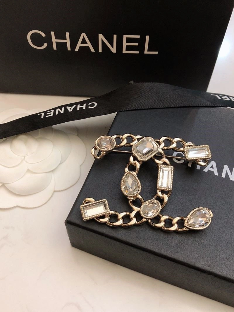 Cut-rate Chanel Brooches