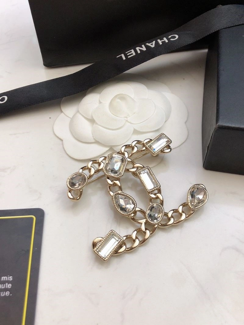 Cut-rate Chanel Brooches