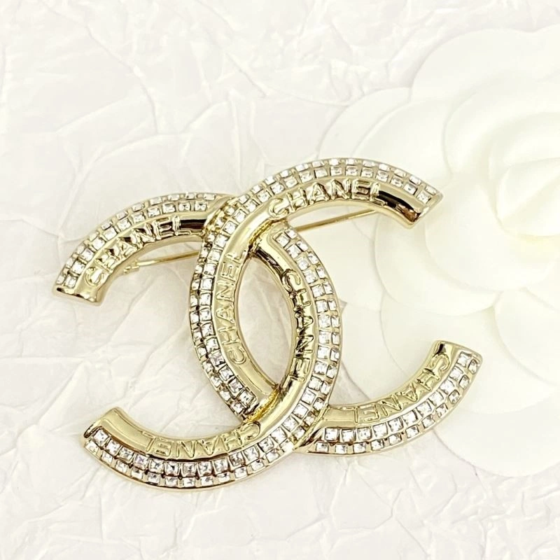 Top mirror Chanel Brooches