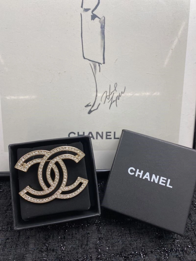 Cut-rate Chanel Brooches
