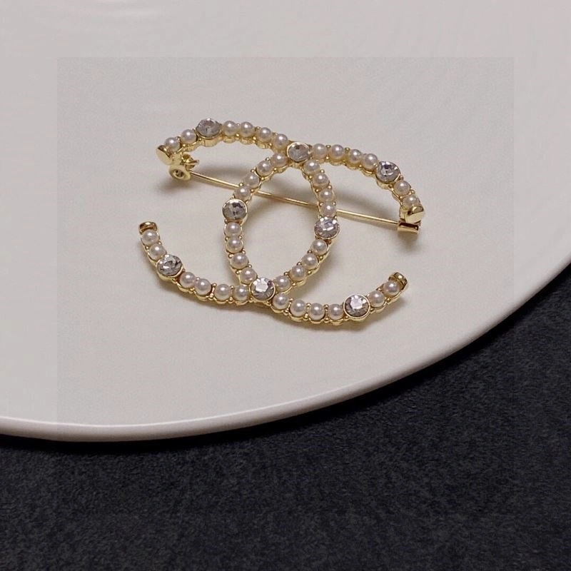 Cut-rate Chanel Brooches