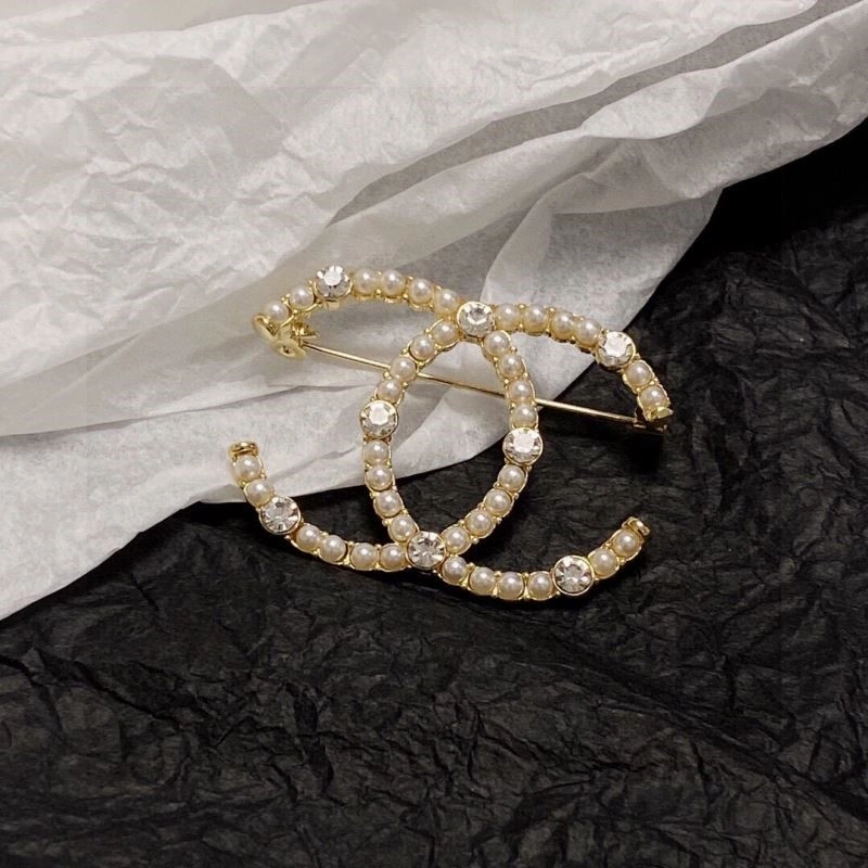 Cut-rate Chanel Brooches