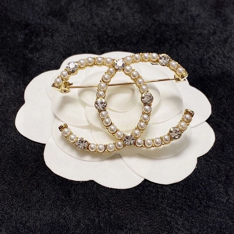 Cut-rate Chanel Brooches