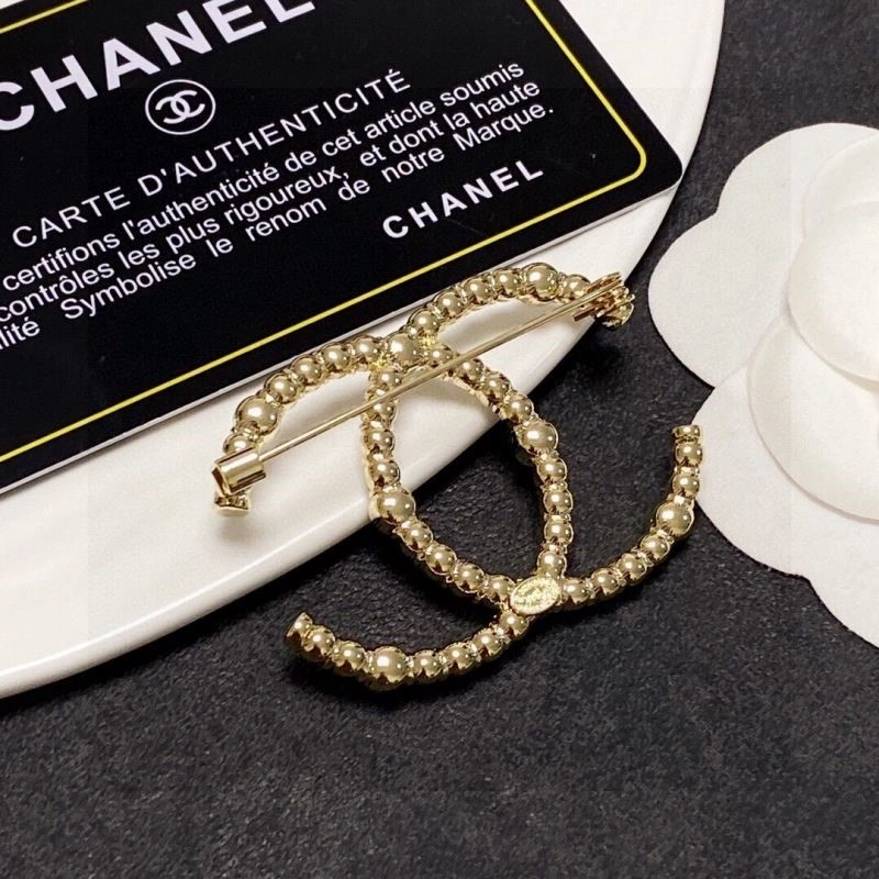 Cut-rate Chanel Brooches