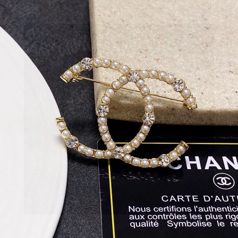 Cut-rate Chanel Brooches
