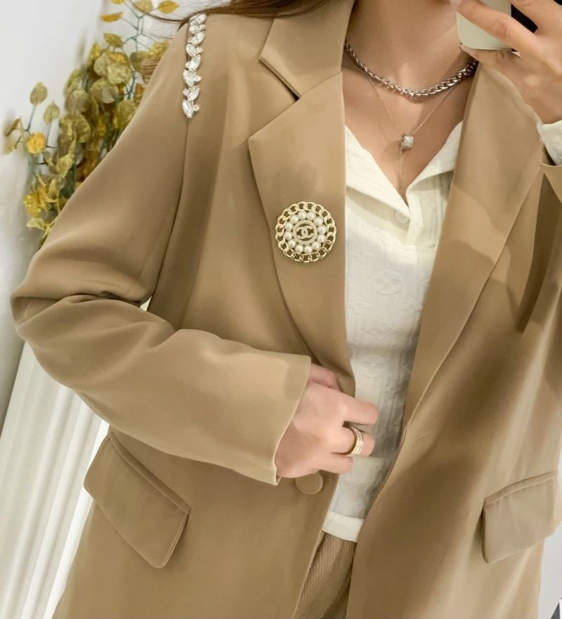 Reasonably priced Chanel Brooches