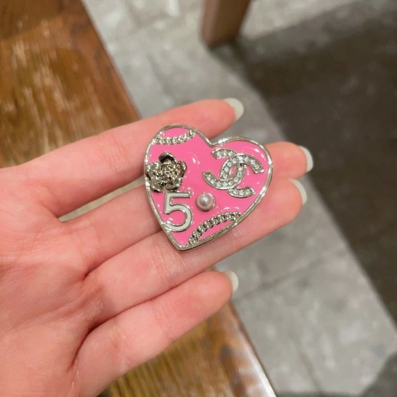 Cut-rate Chanel Brooches