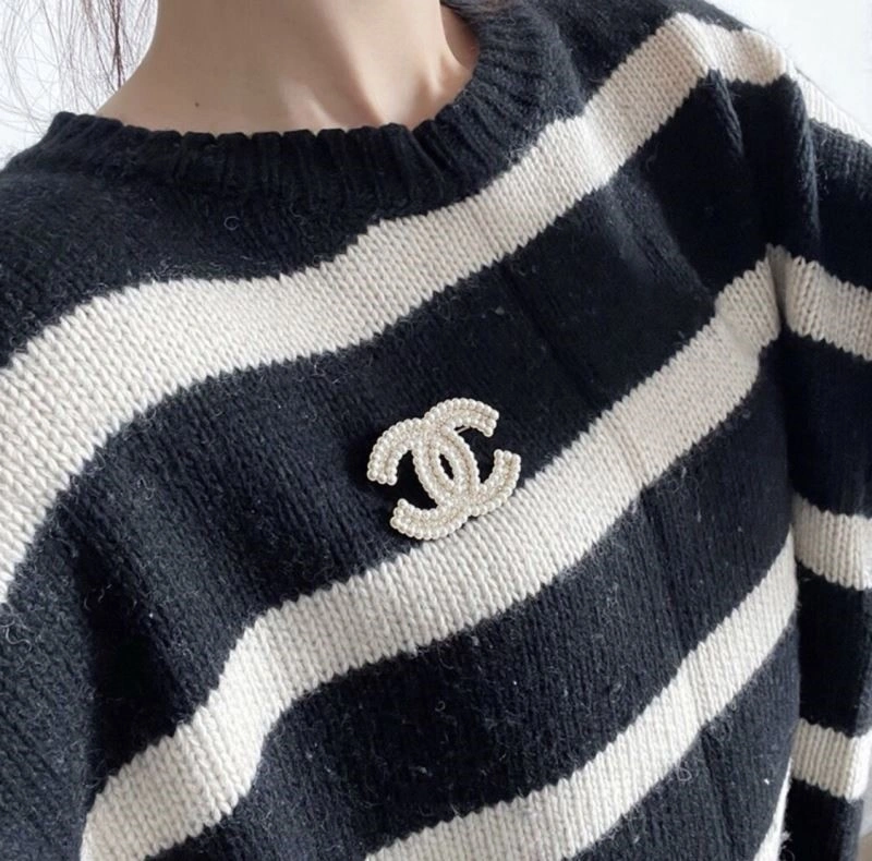 Indistinguishable Chanel Brooches