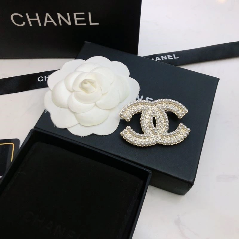 Indistinguishable Chanel Brooches