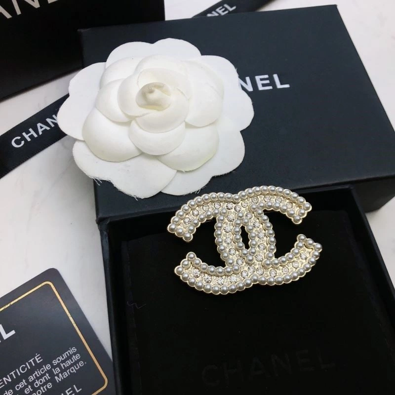 Indistinguishable Chanel Brooches