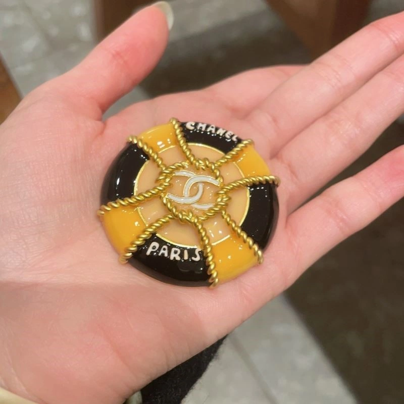 Reasonably priced Chanel Brooches