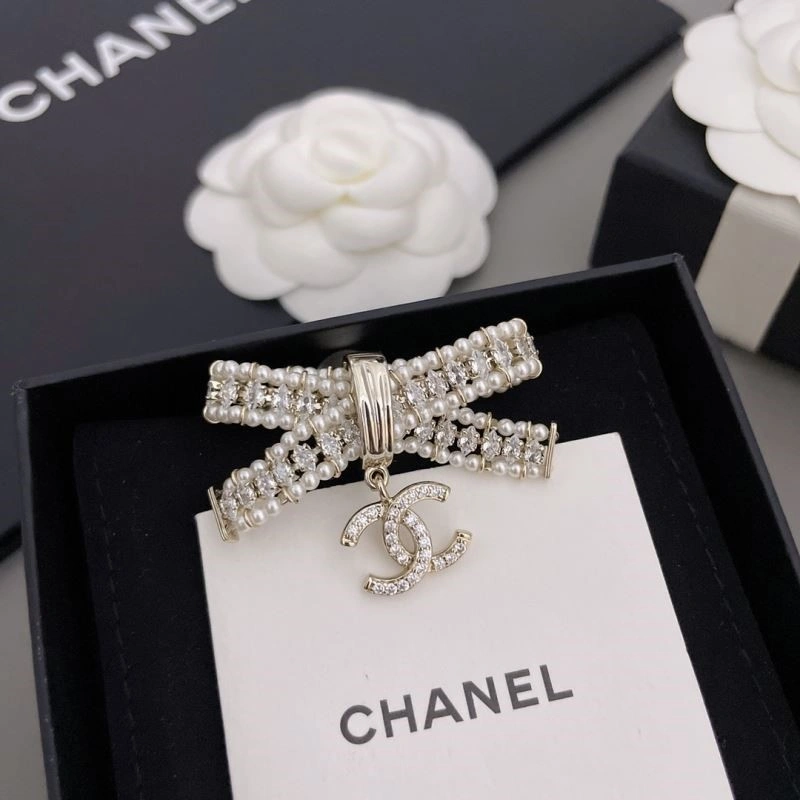 Cut-rate Chanel Brooches