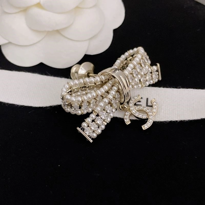 Cut-rate Chanel Brooches