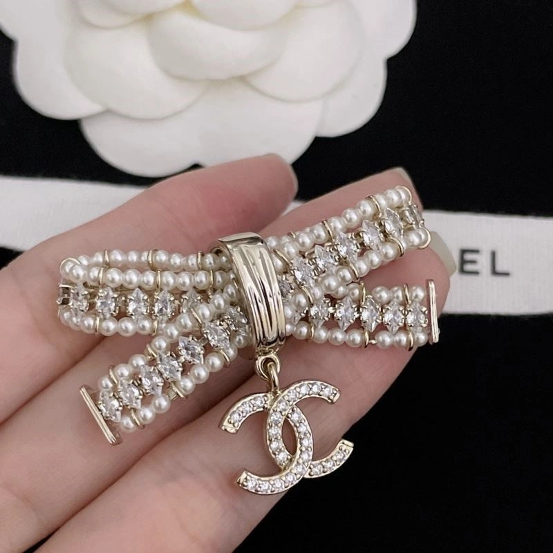 Cut-rate Chanel Brooches