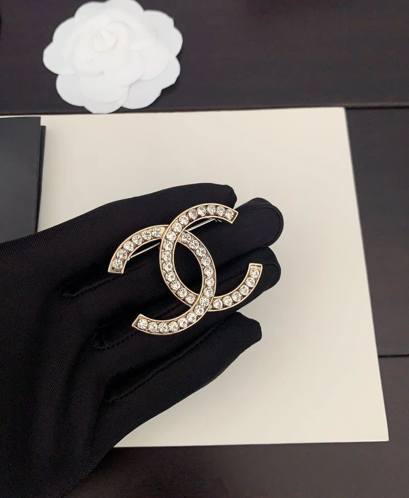 Indistinguishable Chanel Brooches