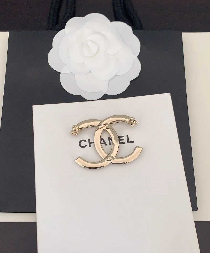 Indistinguishable Chanel Brooches