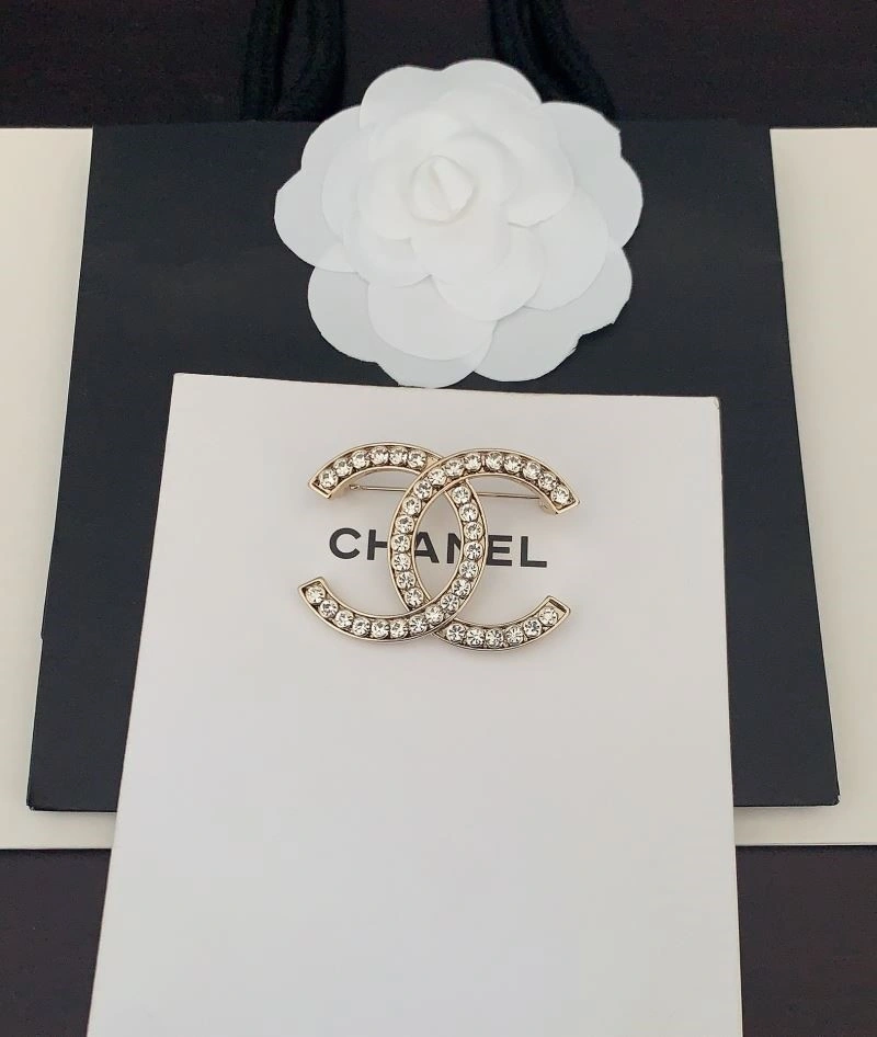 Indistinguishable Chanel Brooches