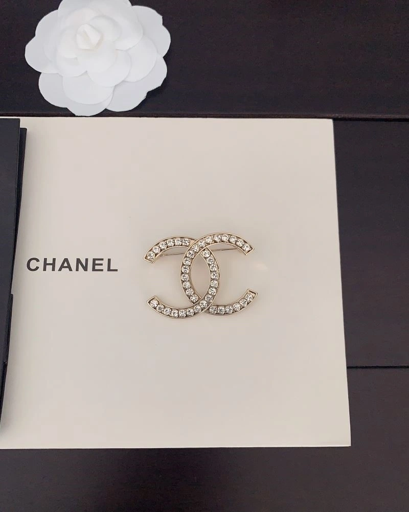 Indistinguishable Chanel Brooches