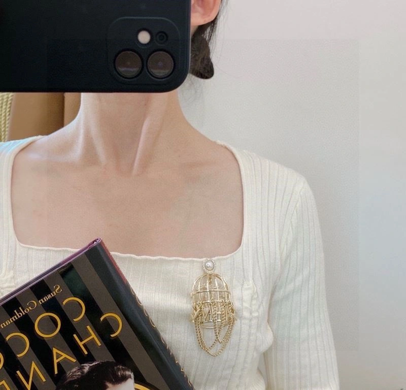 Cut-rate Chanel Brooches