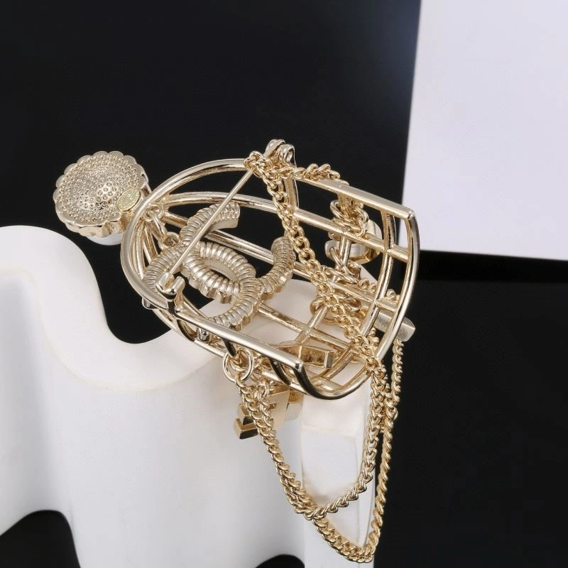 Cut-rate Chanel Brooches