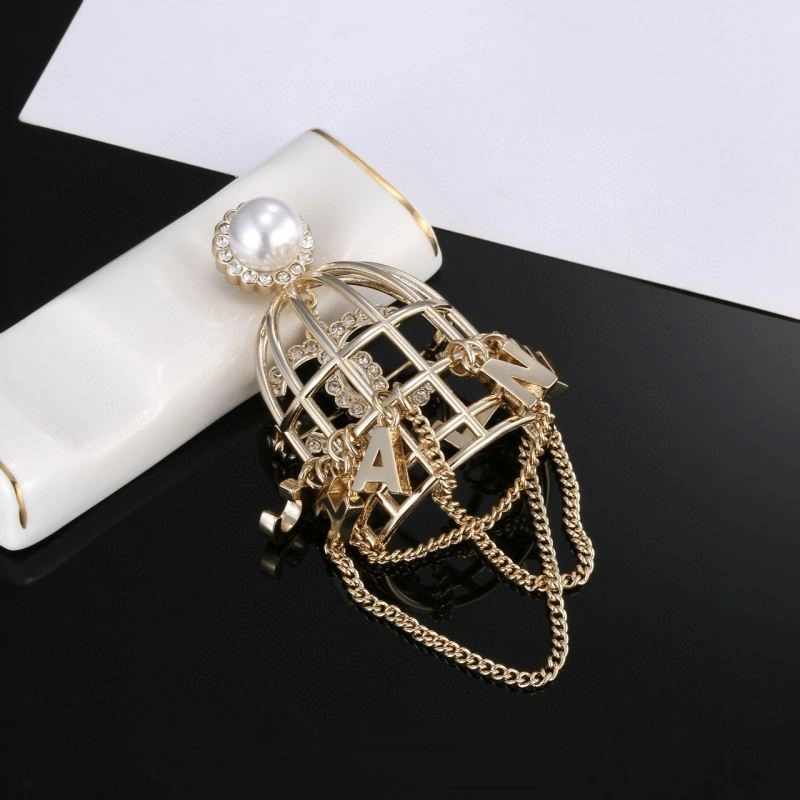 Cut-rate Chanel Brooches