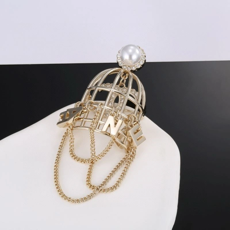Cut-rate Chanel Brooches