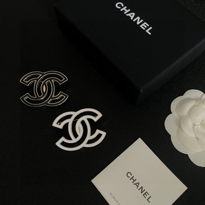 Cut-rate Chanel Brooches