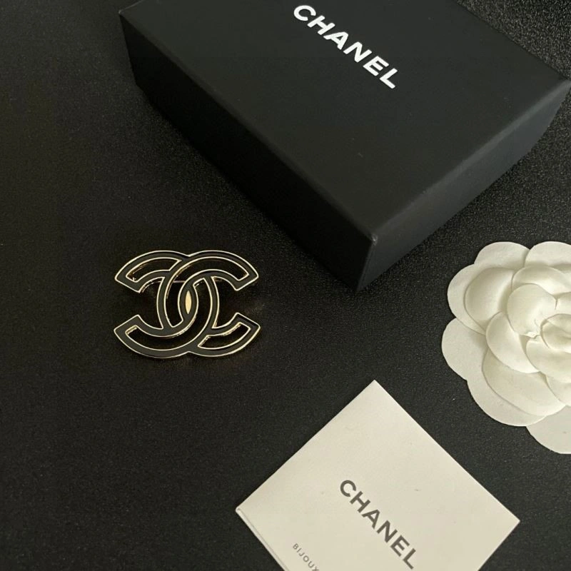 Cut-rate Chanel Brooches