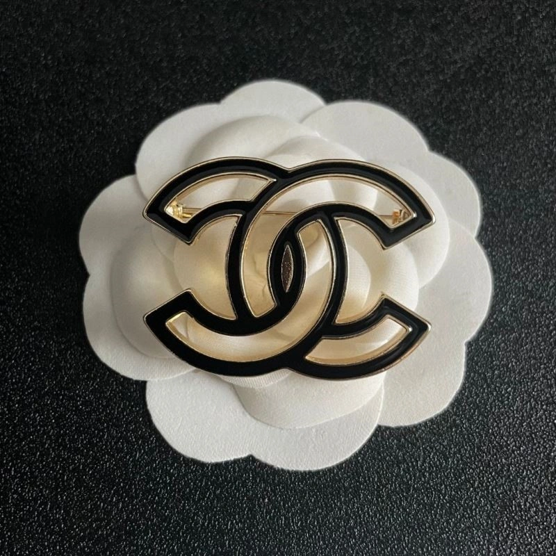 Cut-rate Chanel Brooches