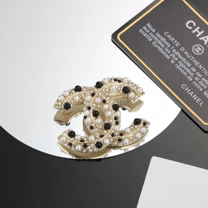 Cut-rate Chanel Brooches