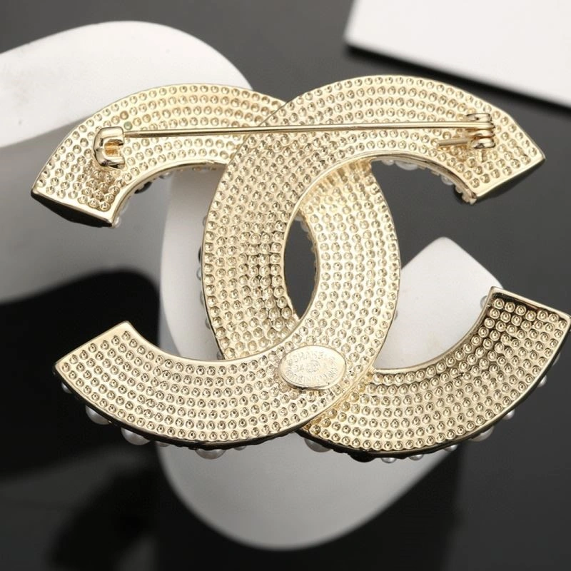 Cut-rate Chanel Brooches
