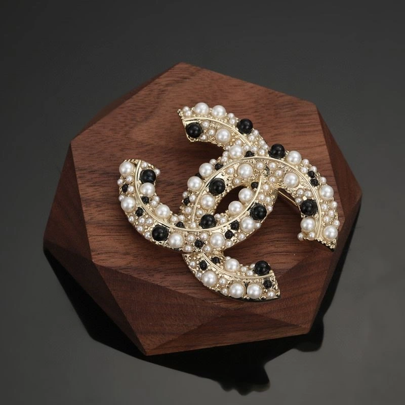 Cut-rate Chanel Brooches