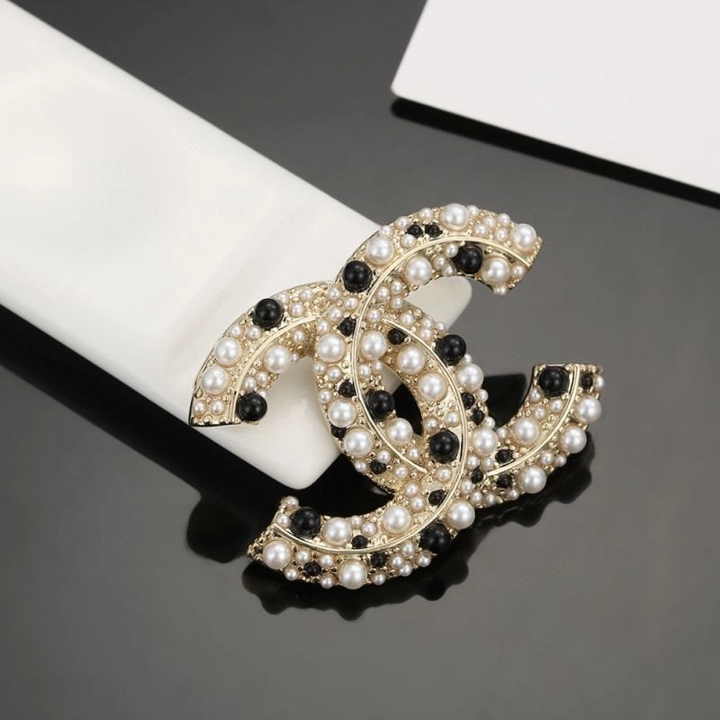Cut-rate Chanel Brooches