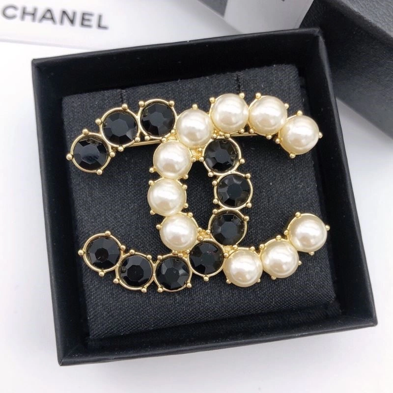 Cut-rate Chanel Brooches