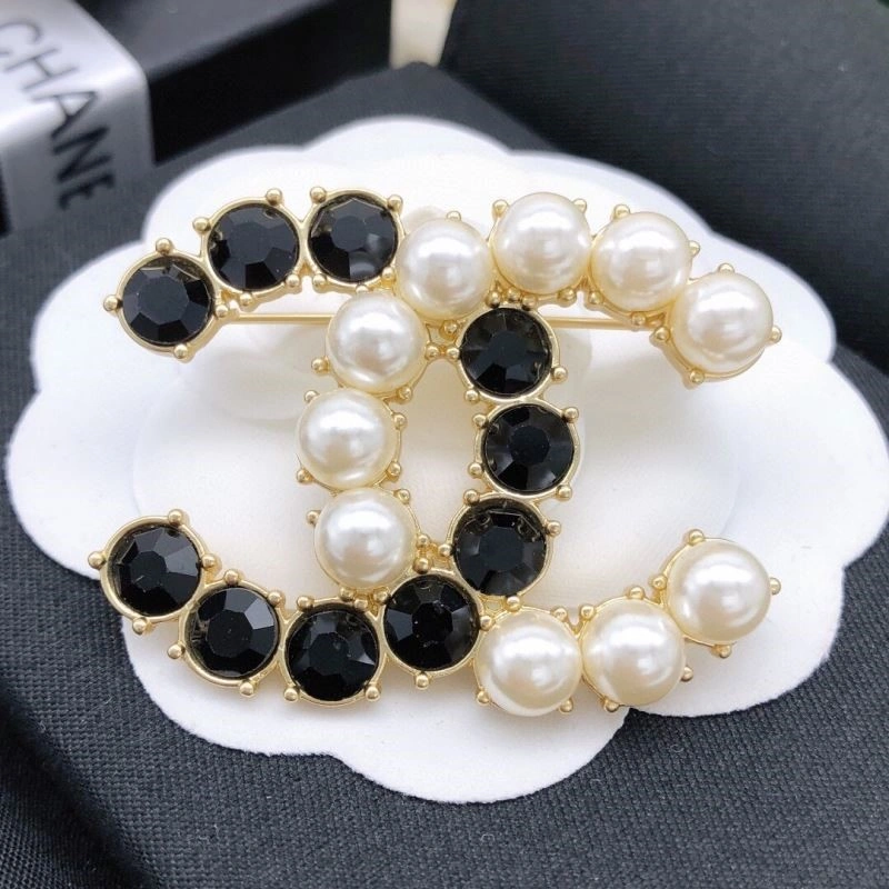 Cut-rate Chanel Brooches
