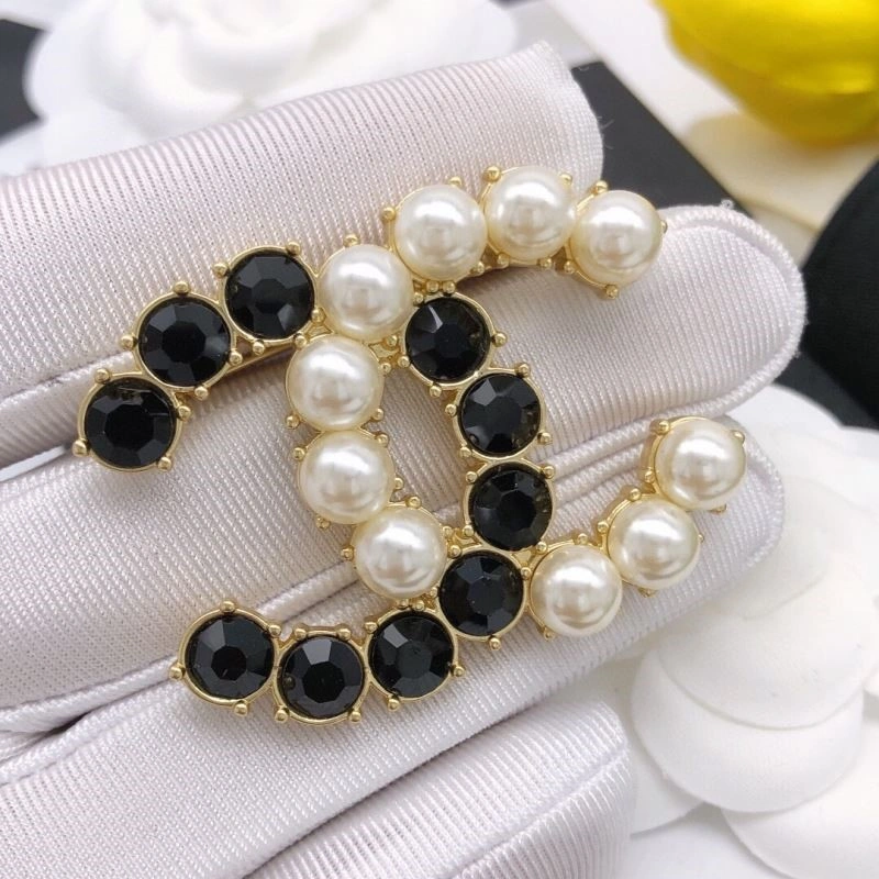 Cut-rate Chanel Brooches