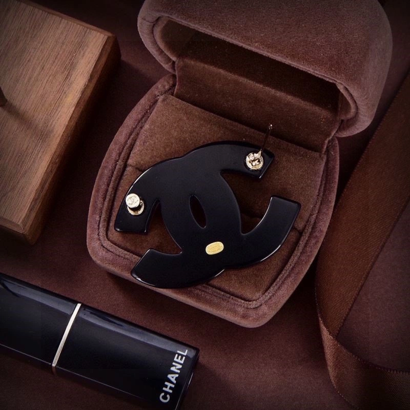 Indistinguishable Chanel Brooches