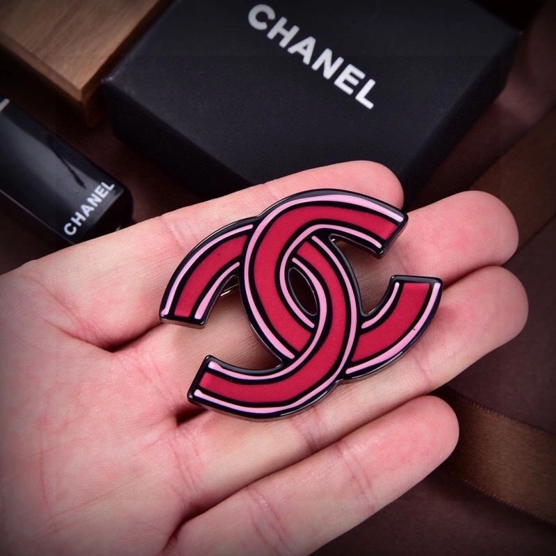 Indistinguishable Chanel Brooches