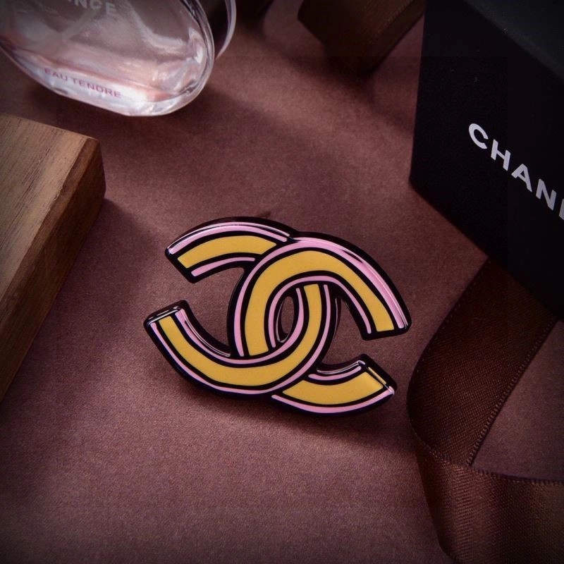 Indistinguishable Chanel Brooches