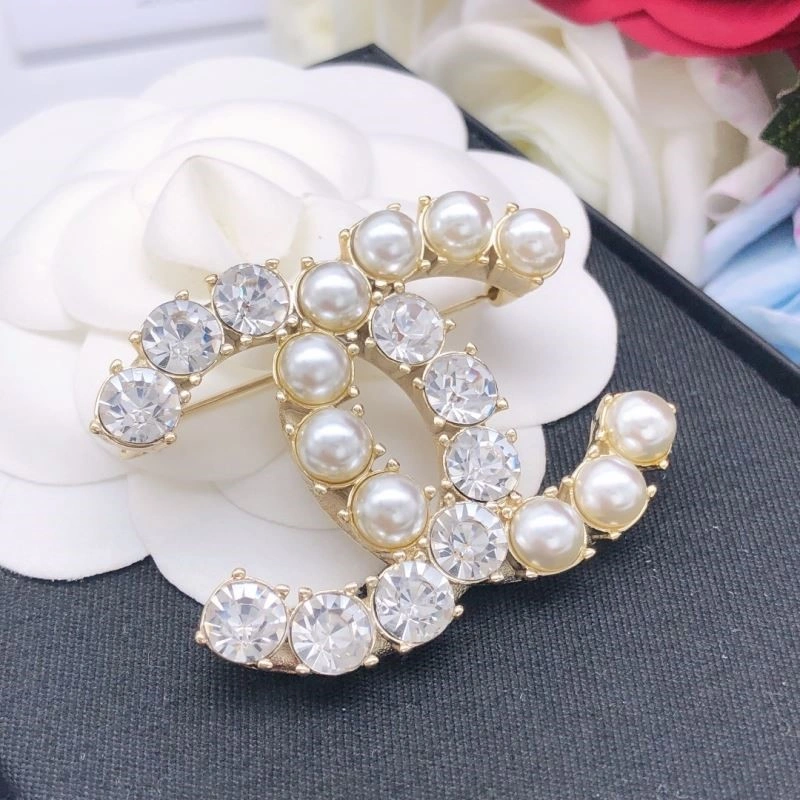 Top match Chanel Brooches