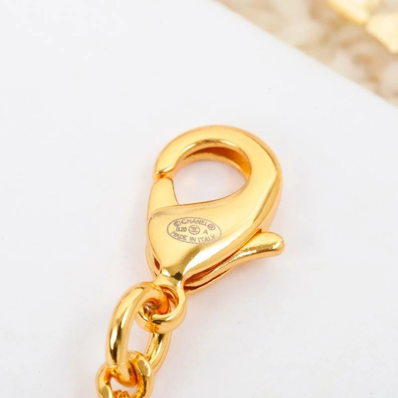 Indistinguishable Chanel Brooches