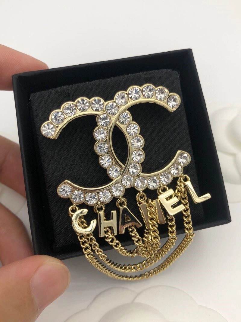 Indistinguishable Chanel Brooches