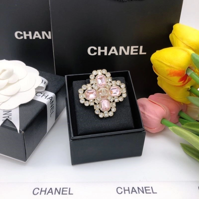 Indistinguishable Chanel Brooches