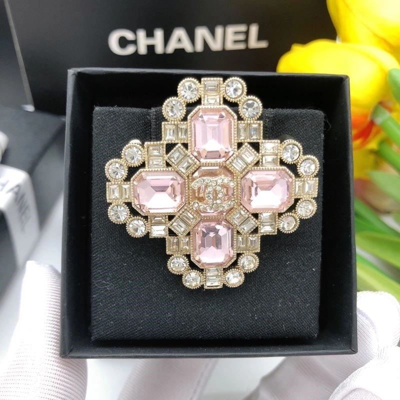 Indistinguishable Chanel Brooches