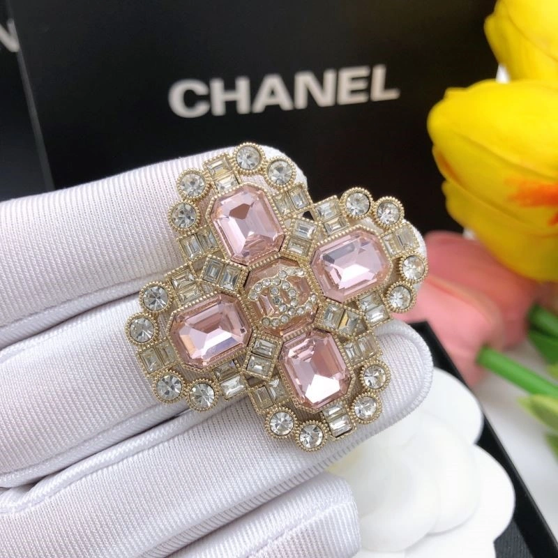 Indistinguishable Chanel Brooches
