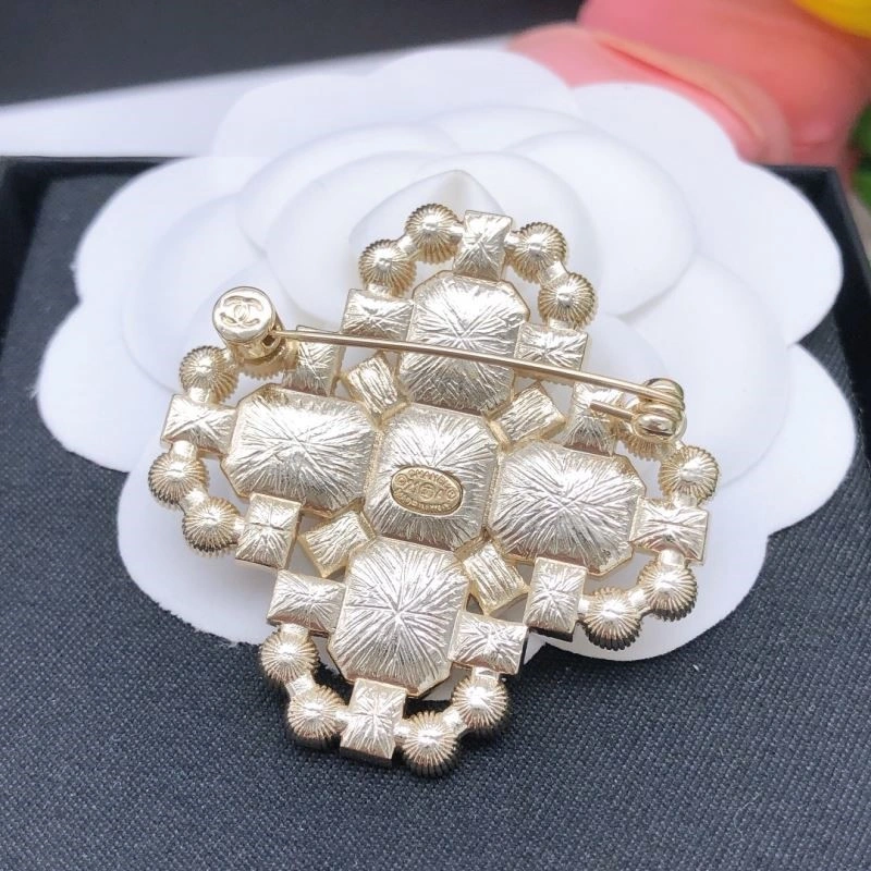 Indistinguishable Chanel Brooches