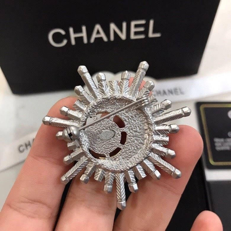 Cut-rate Chanel Brooches