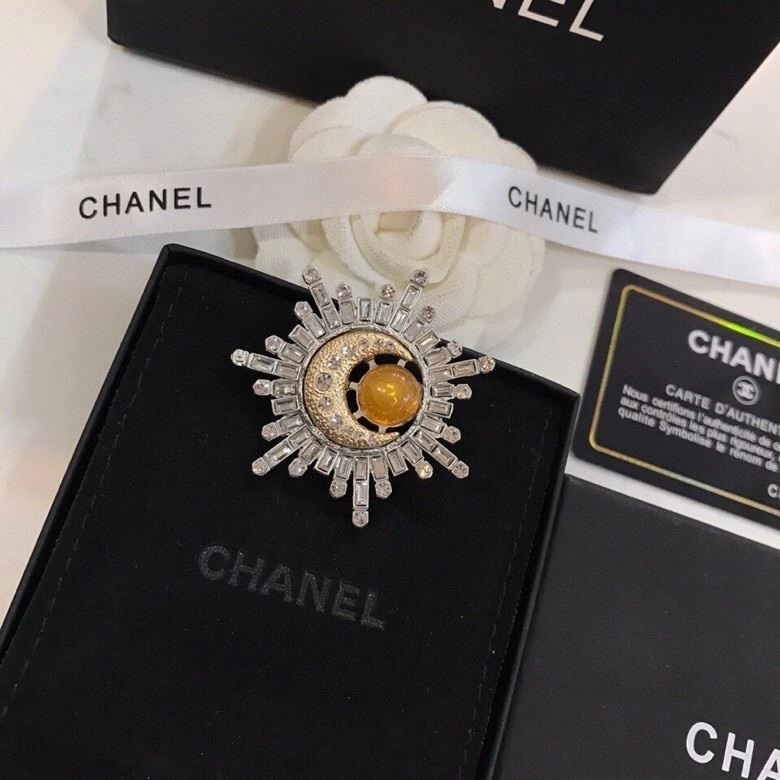 Cut-rate Chanel Brooches